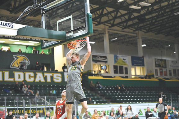 Northern Michigan University men’s basketball team stretching legs for ...